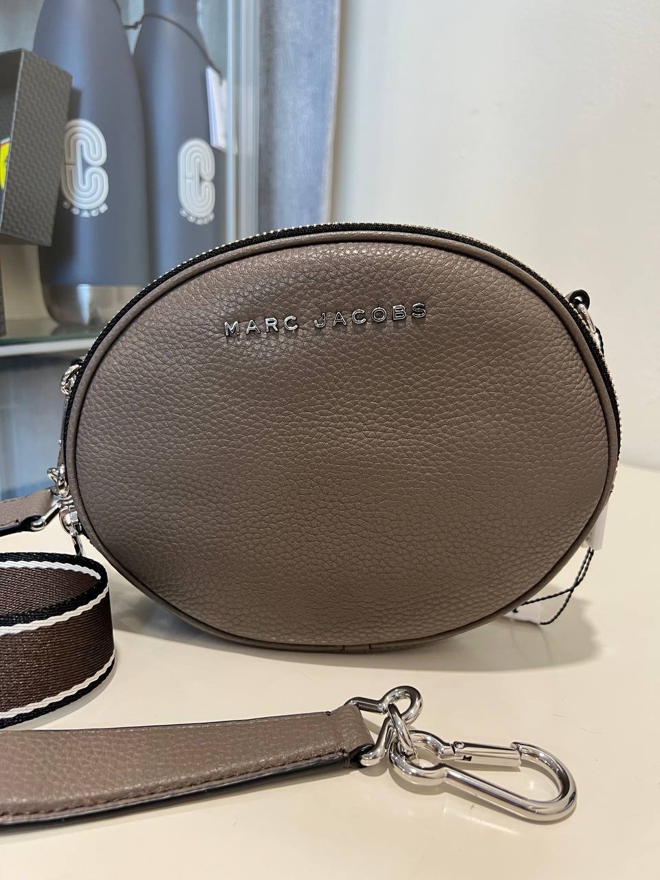 Marc Jacobs Rewind Oval Crossbody in Loam Soil – Exclusively USA